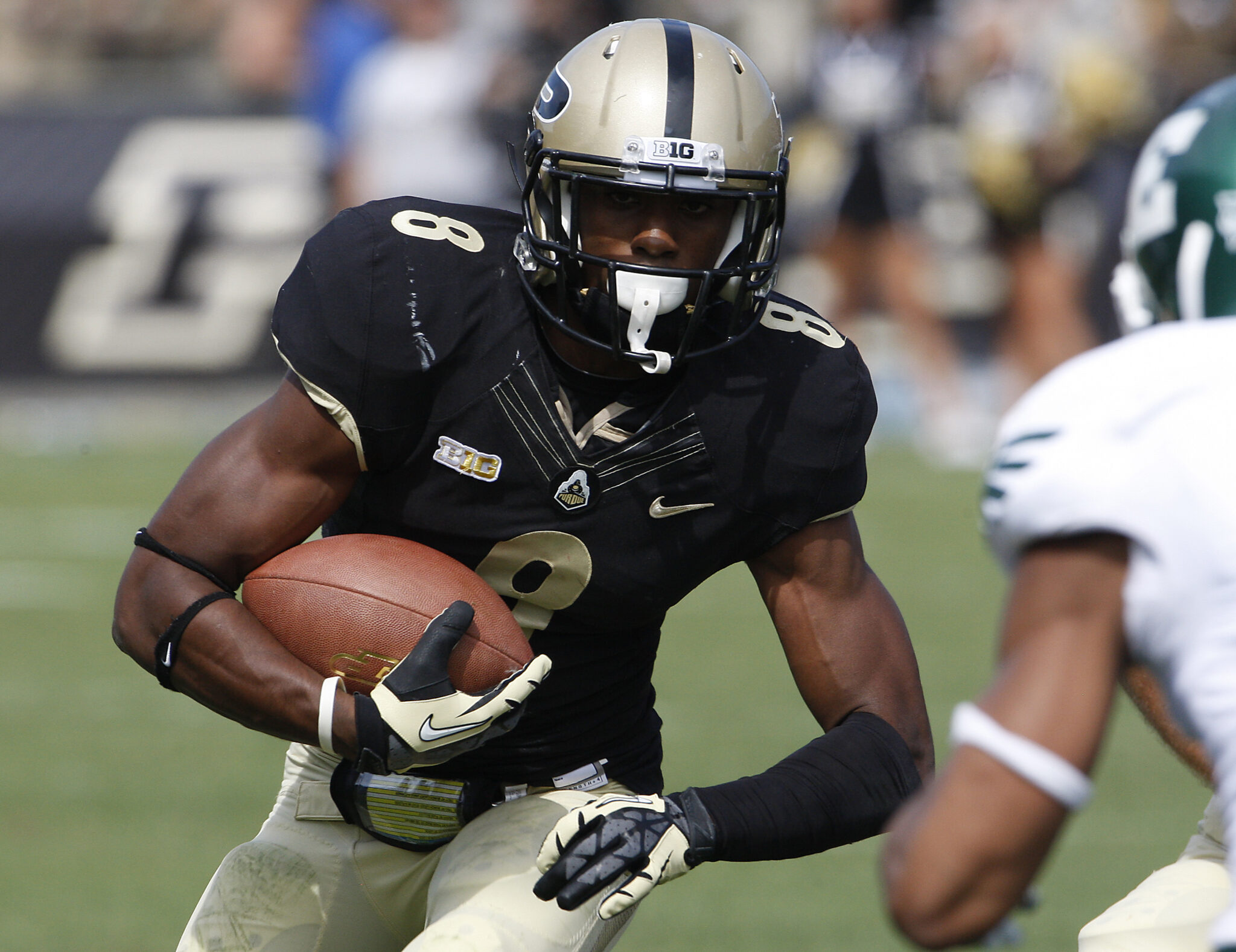 Purdue’s football uniform then and now - The Persistent Pursuit
