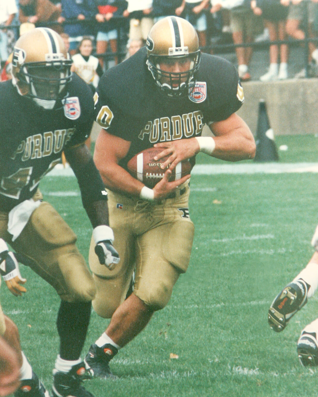Purdue’s football uniform then and now - Purdue Stories