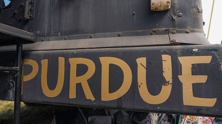 Explore photos of a bus for Purdue football tailgates