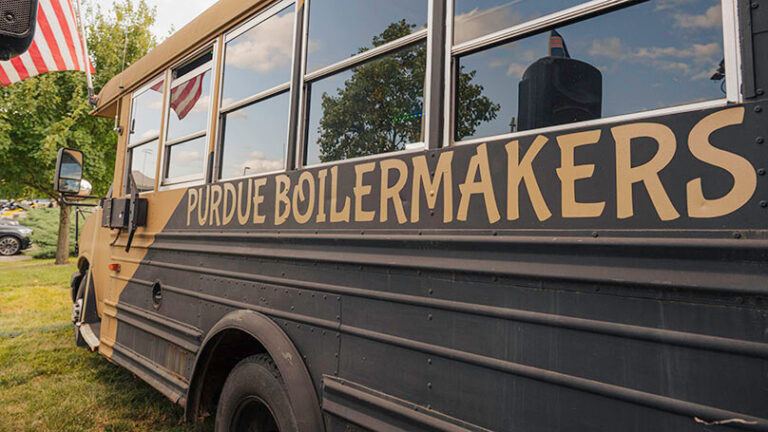 Explore photos of a bus for Purdue football tailgates